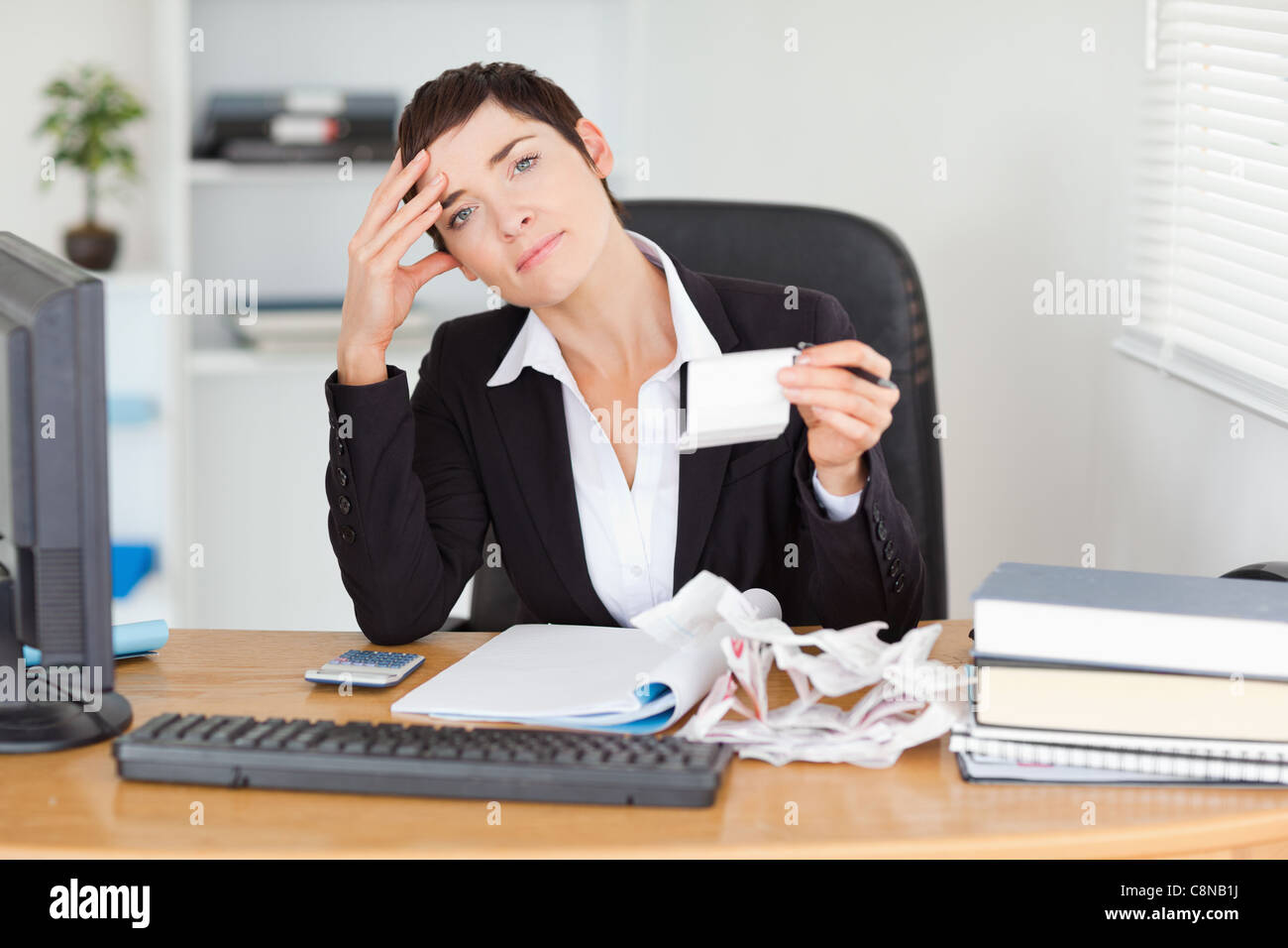 Serious accountant checking receipts Stock Photo - Alamy