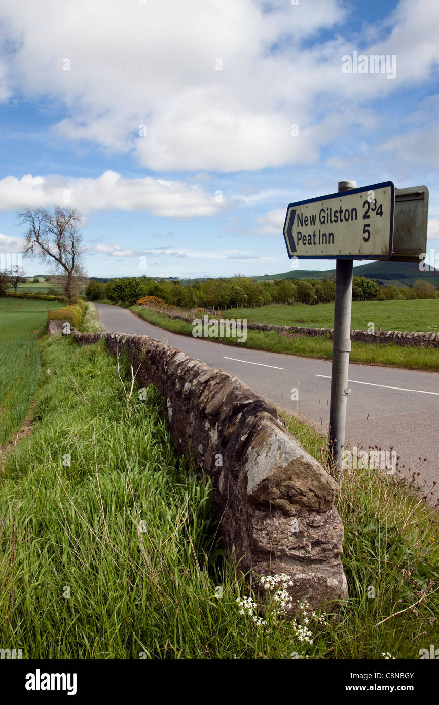 Great Britain, Scotland, Fife, Landscape with road and road sign in ...
