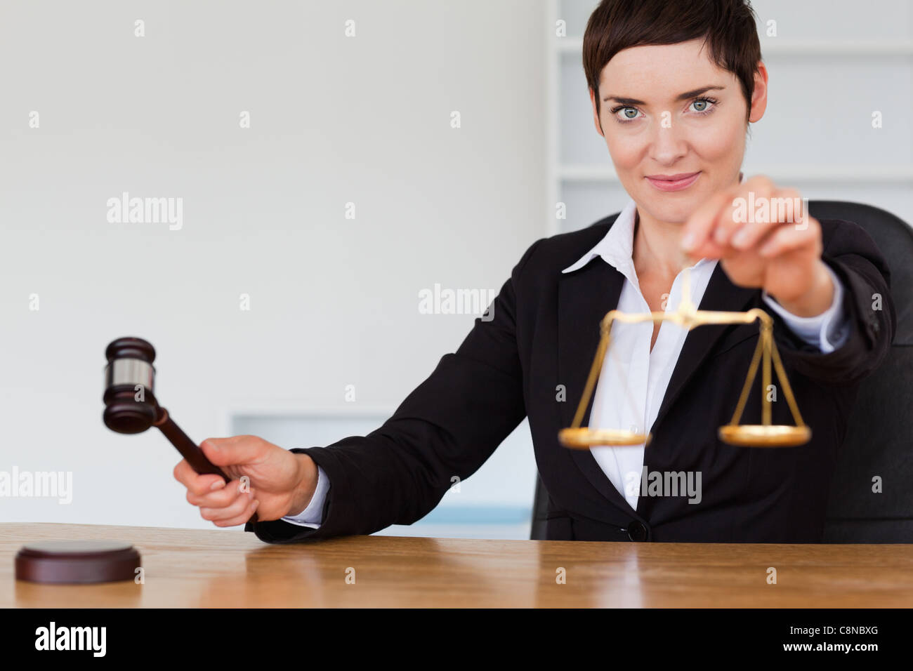 Judge with a gavel and the justice scale Stock Photo - Alamy