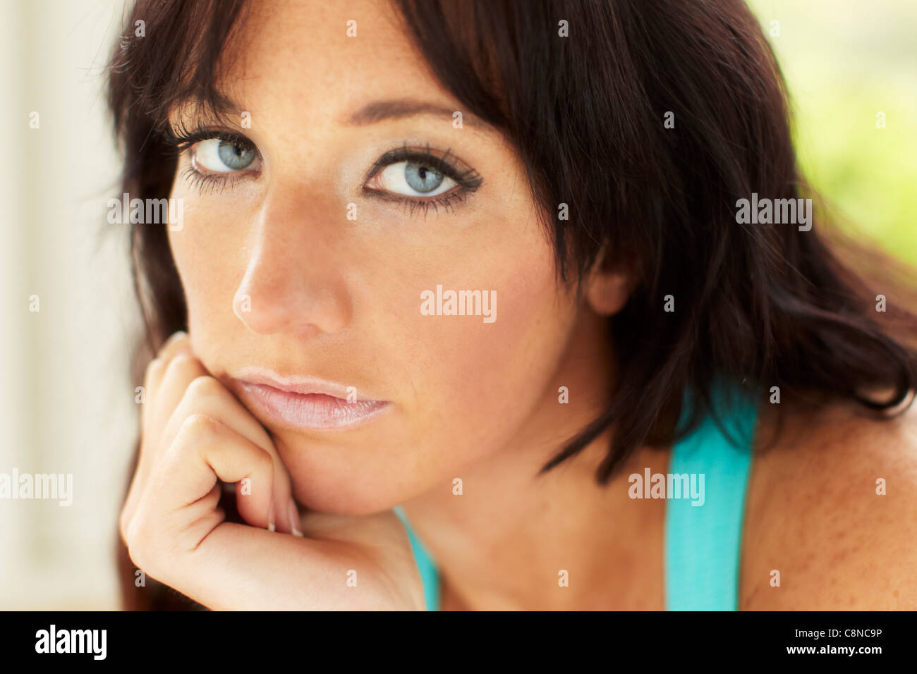 Sad looking woman Stock Photo - Alamy