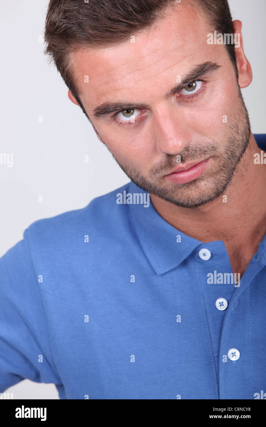 Man looking angry Stock Photo - Alamy