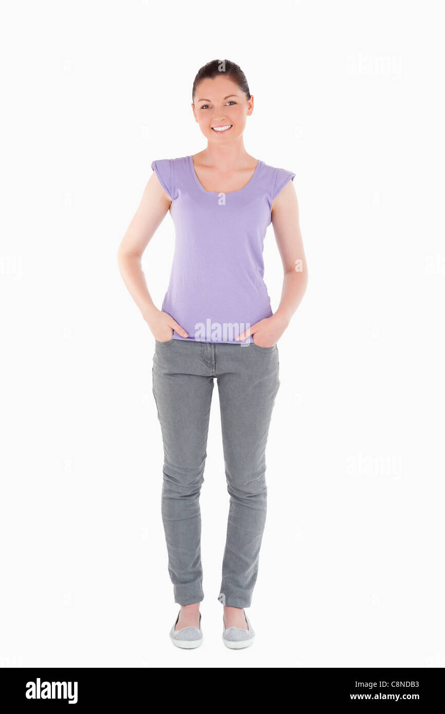 Pretty woman posing while standing Stock Photo - Alamy