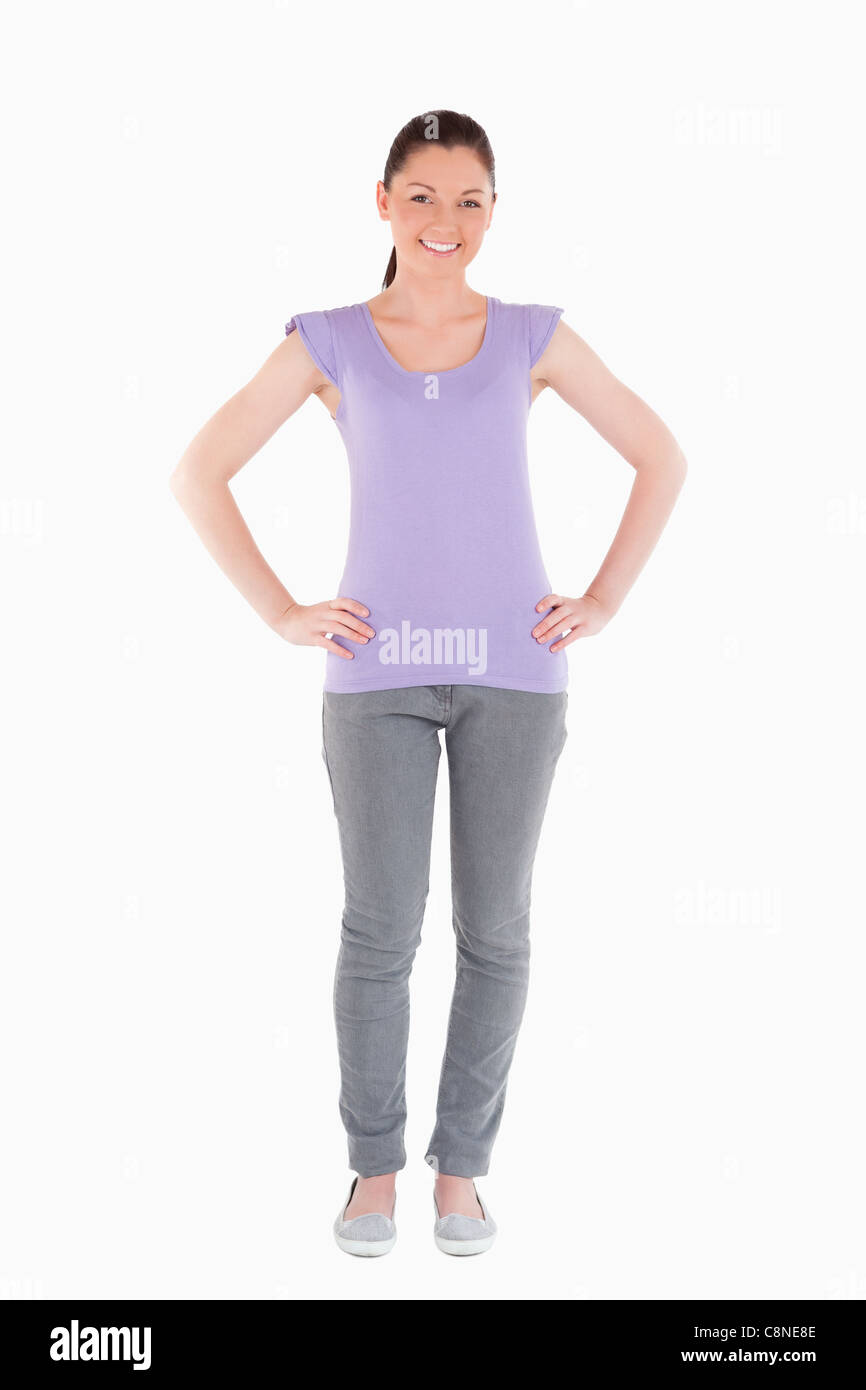 Beautiful woman posing while standing Stock Photo - Alamy