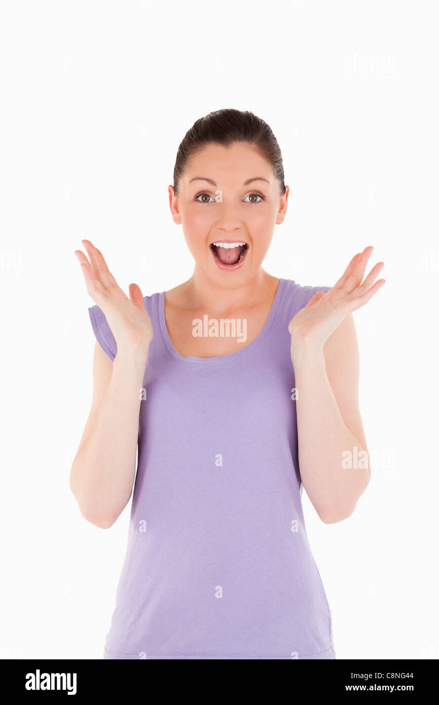 Enthusiastic female posing while standing Stock Photo - Alamy