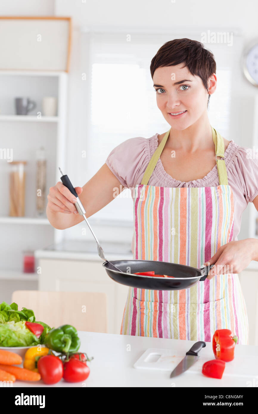 Gorgeous woman with a pan Stock Photo - Alamy