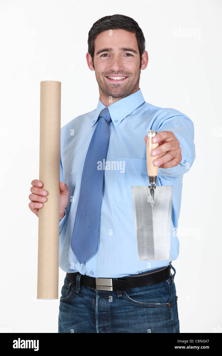 An architect handing a trowel Stock Photo - Alamy