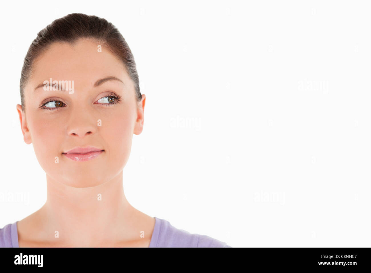 Portrait of a good looking female posing while standing Stock Photo - Alamy