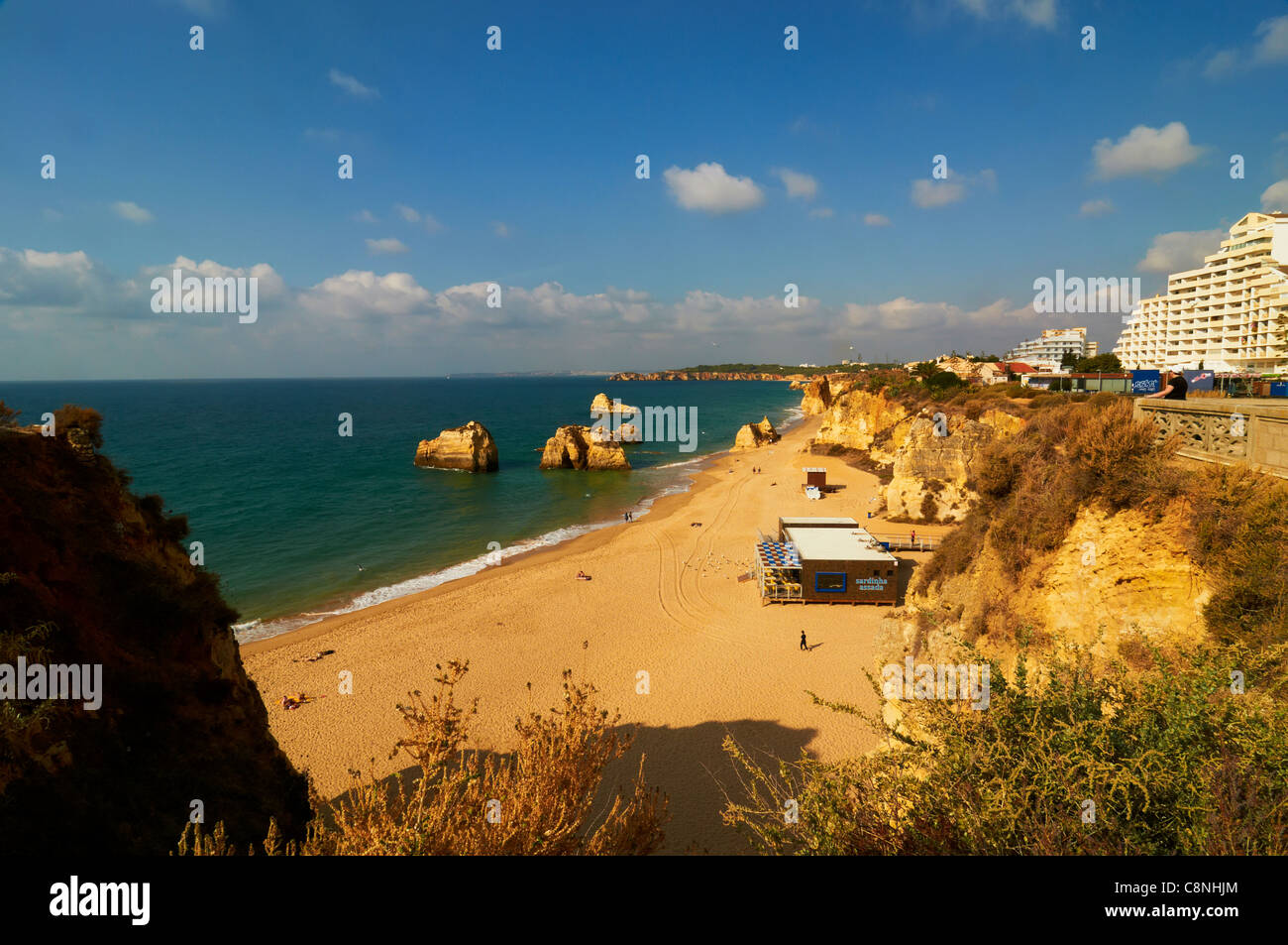 Main beach in Praia da Rocha on a fine sunny day in the Algarve ...
