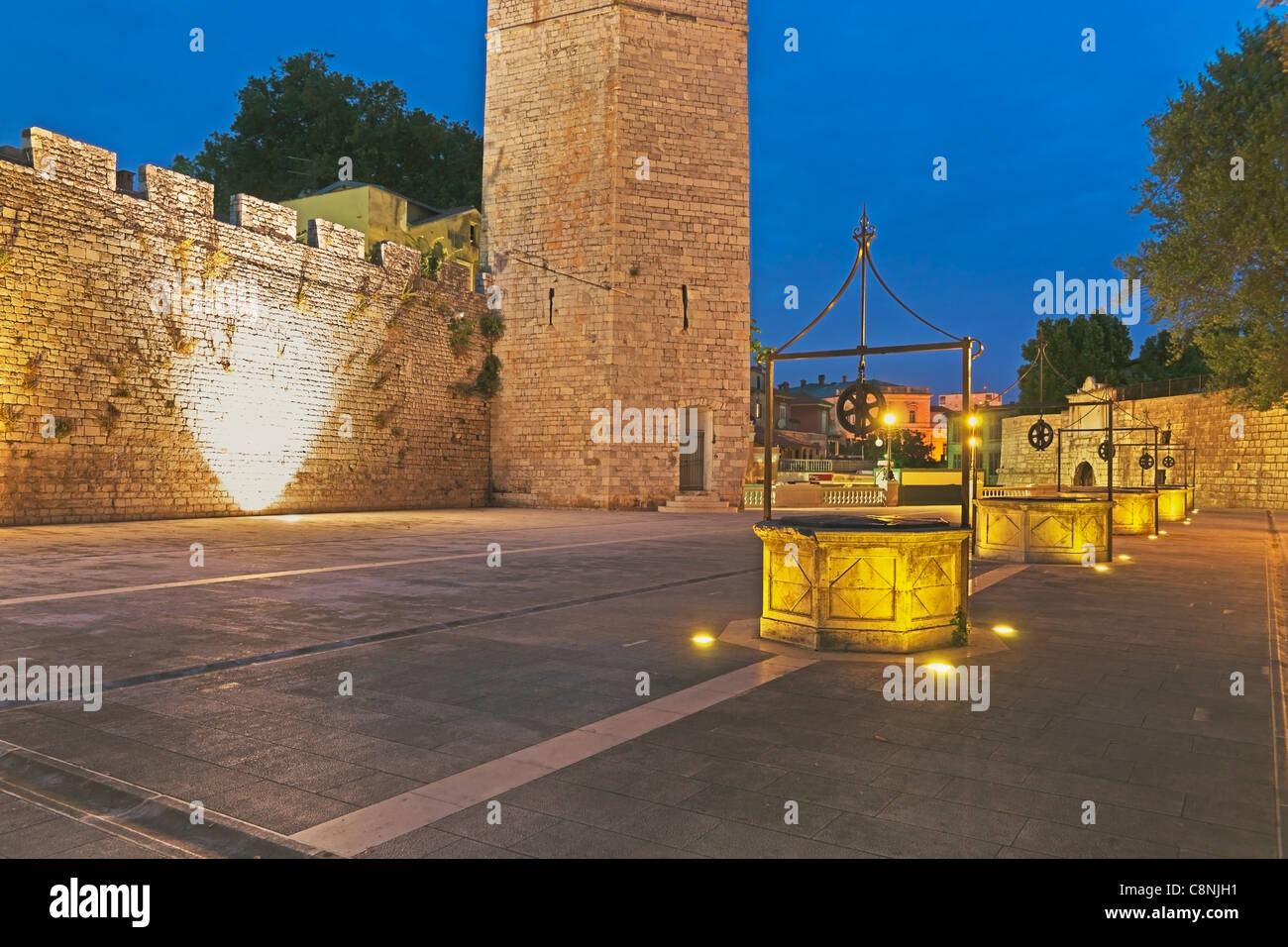 The Five Wells Square in front of the city wall and the Captain's tower ...
