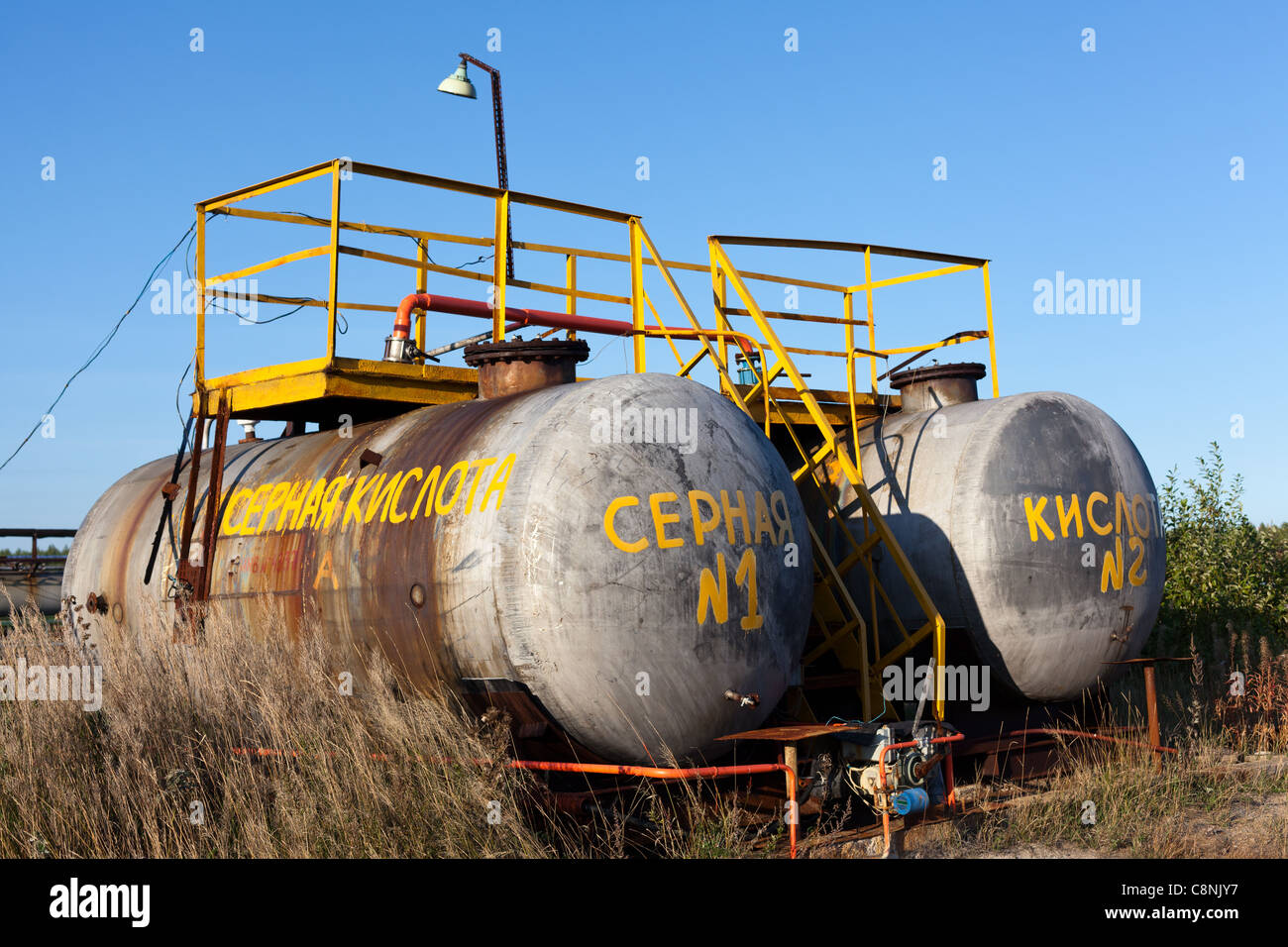 Chemical storage tank with sulfuric acid. Outdoors, plant in Russia ...