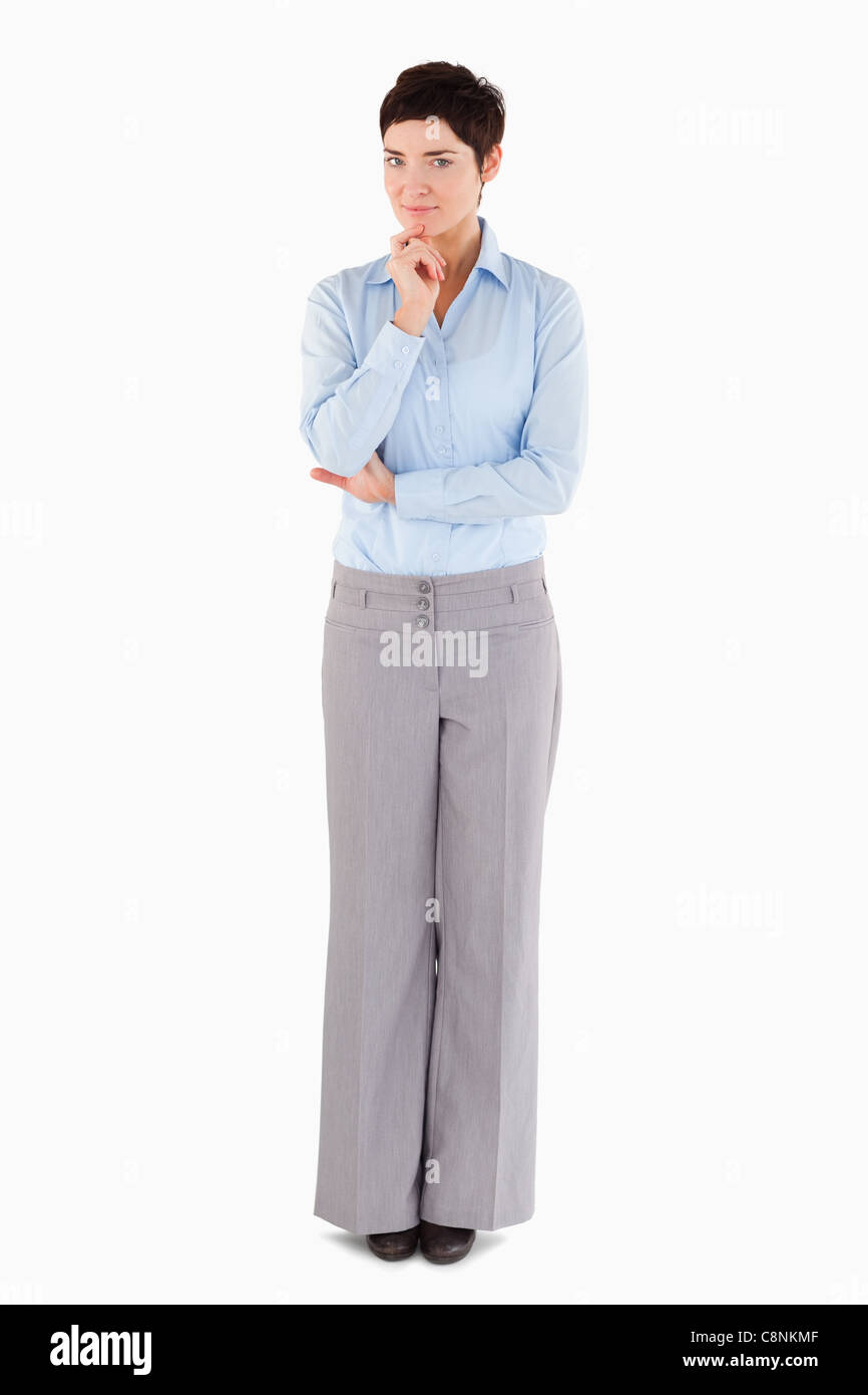 Thoughtful businesswoman standing up Stock Photo - Alamy