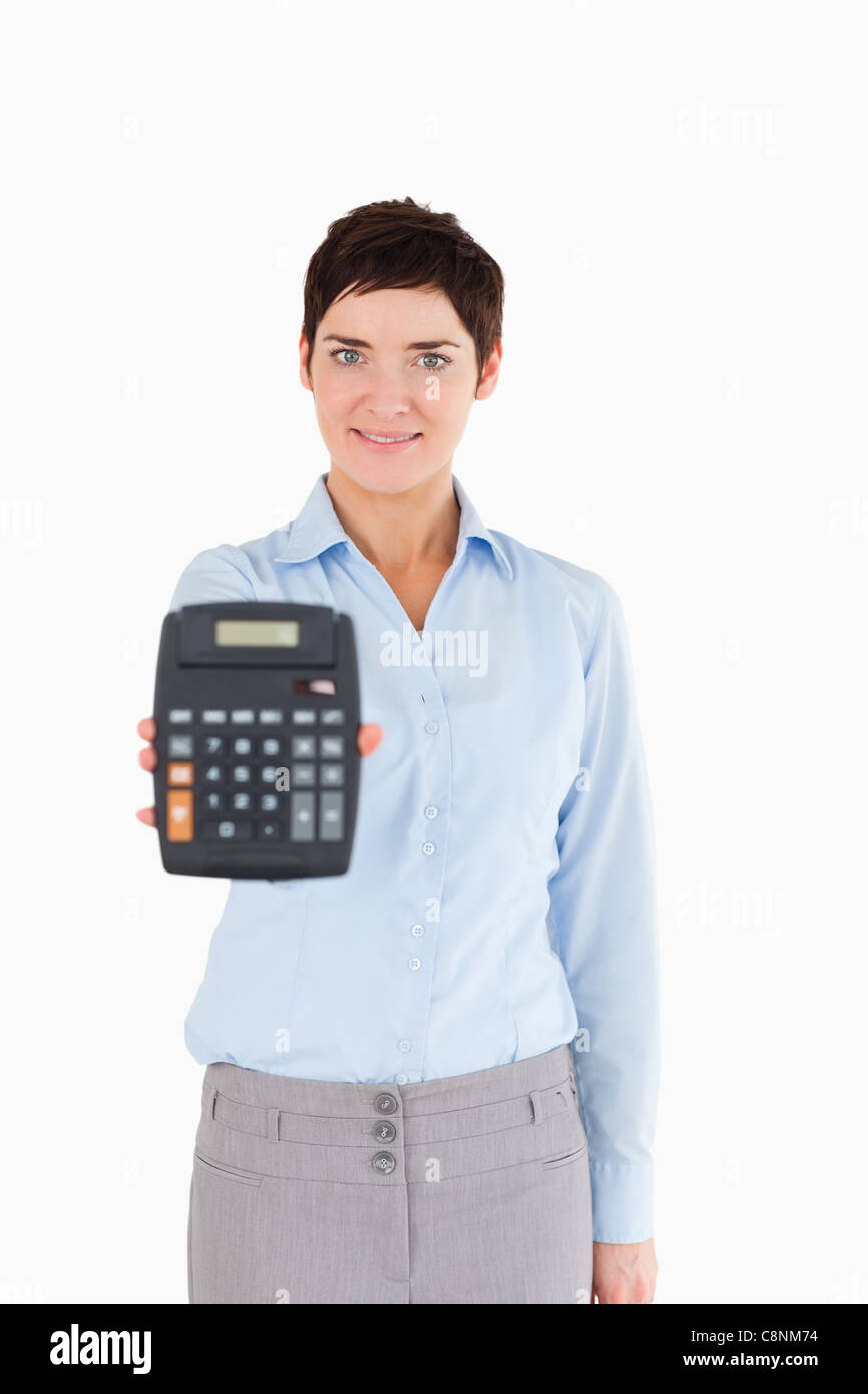 Woman showing a calculator Stock Photo - Alamy