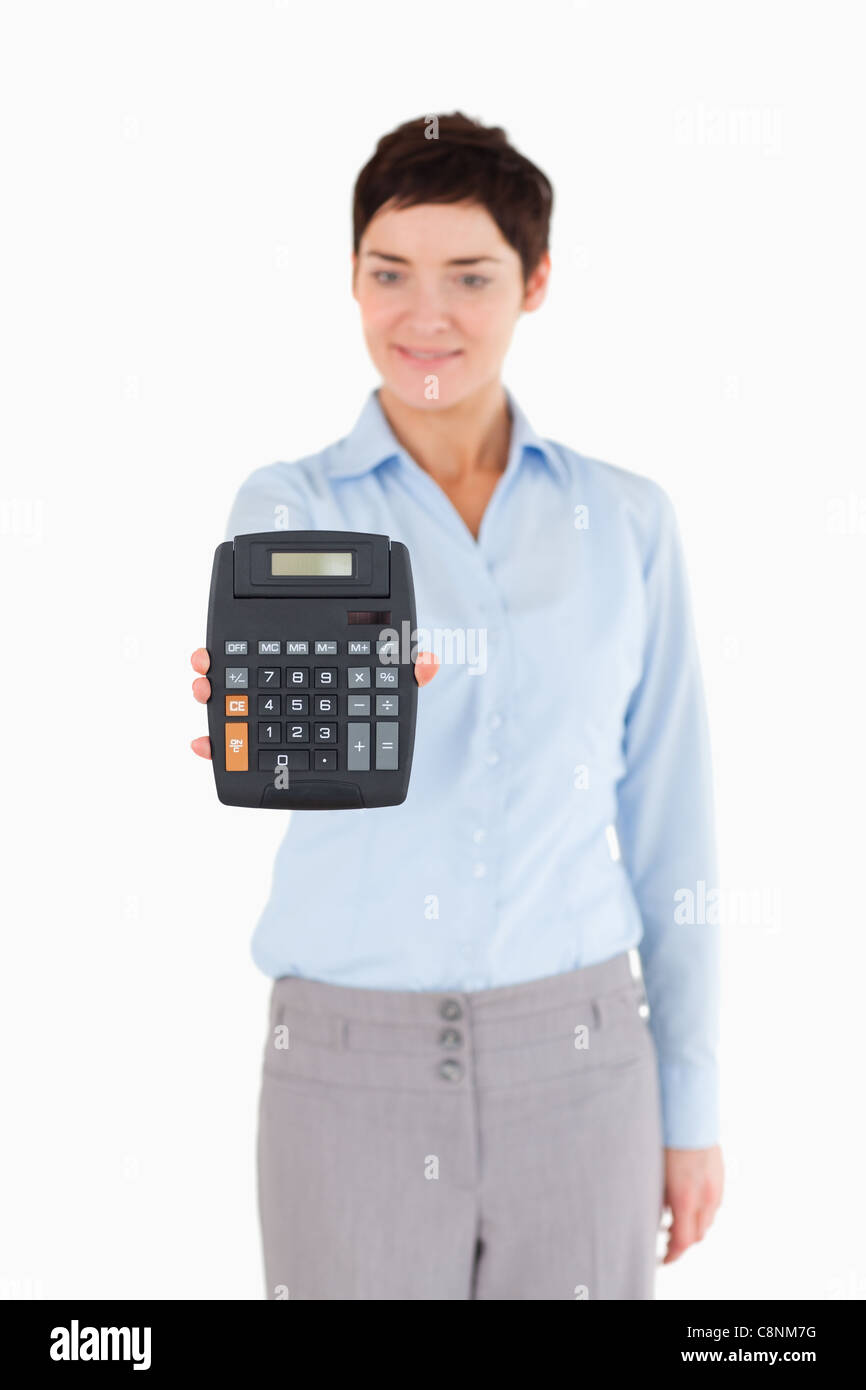 Office worker showing a calculator Stock Photo - Alamy