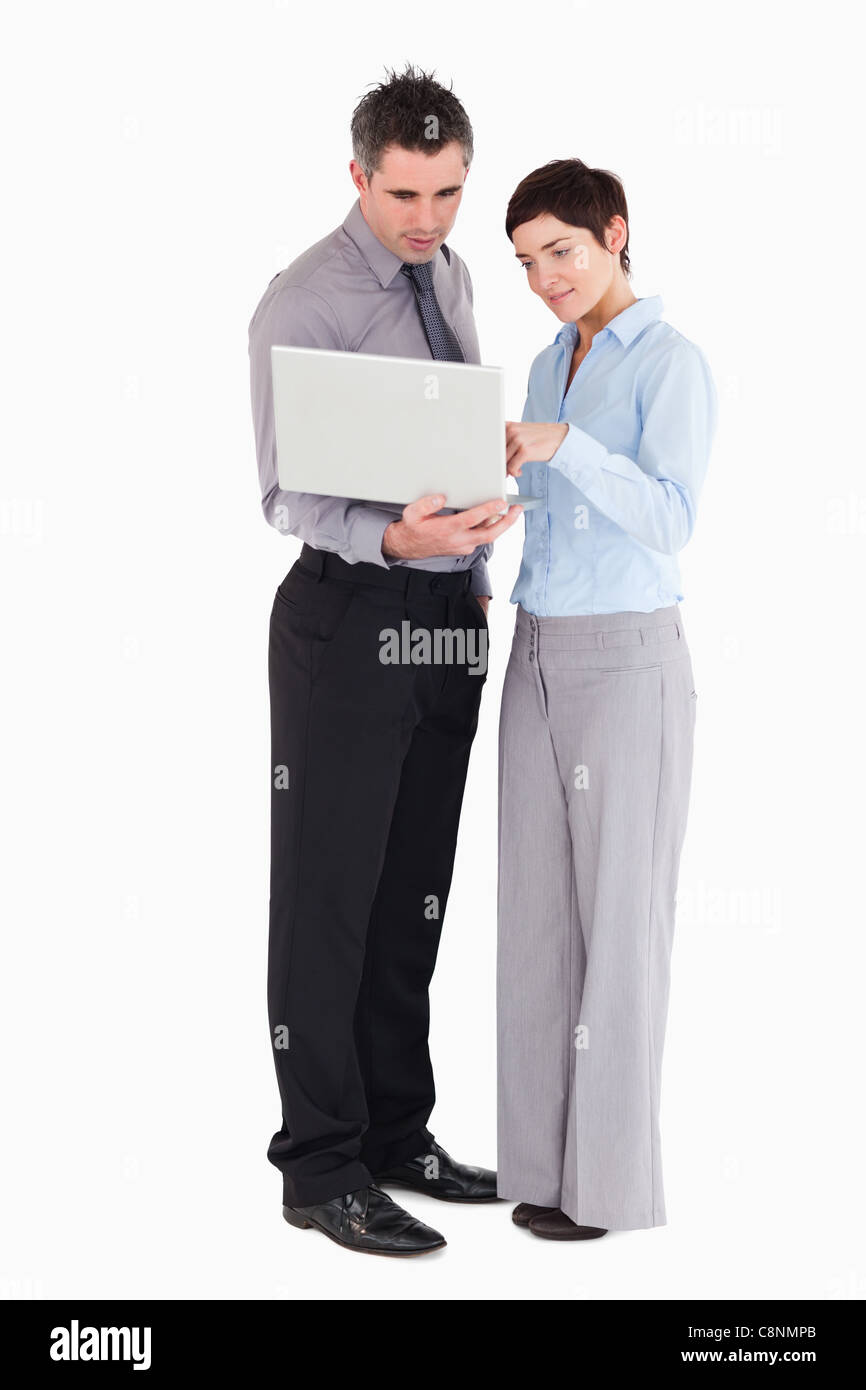 Office workers using a laptop Stock Photo - Alamy
