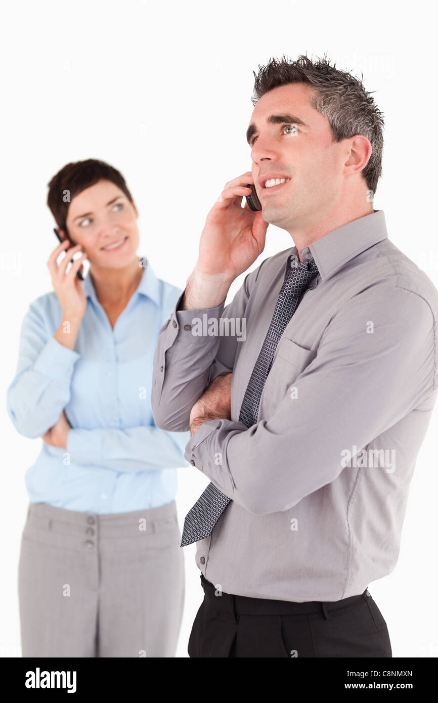 Portrait of managers making a phone call Stock Photo - Alamy