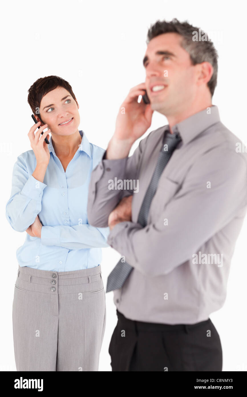 Portrait of office workers making a phone call Stock Photo - Alamy