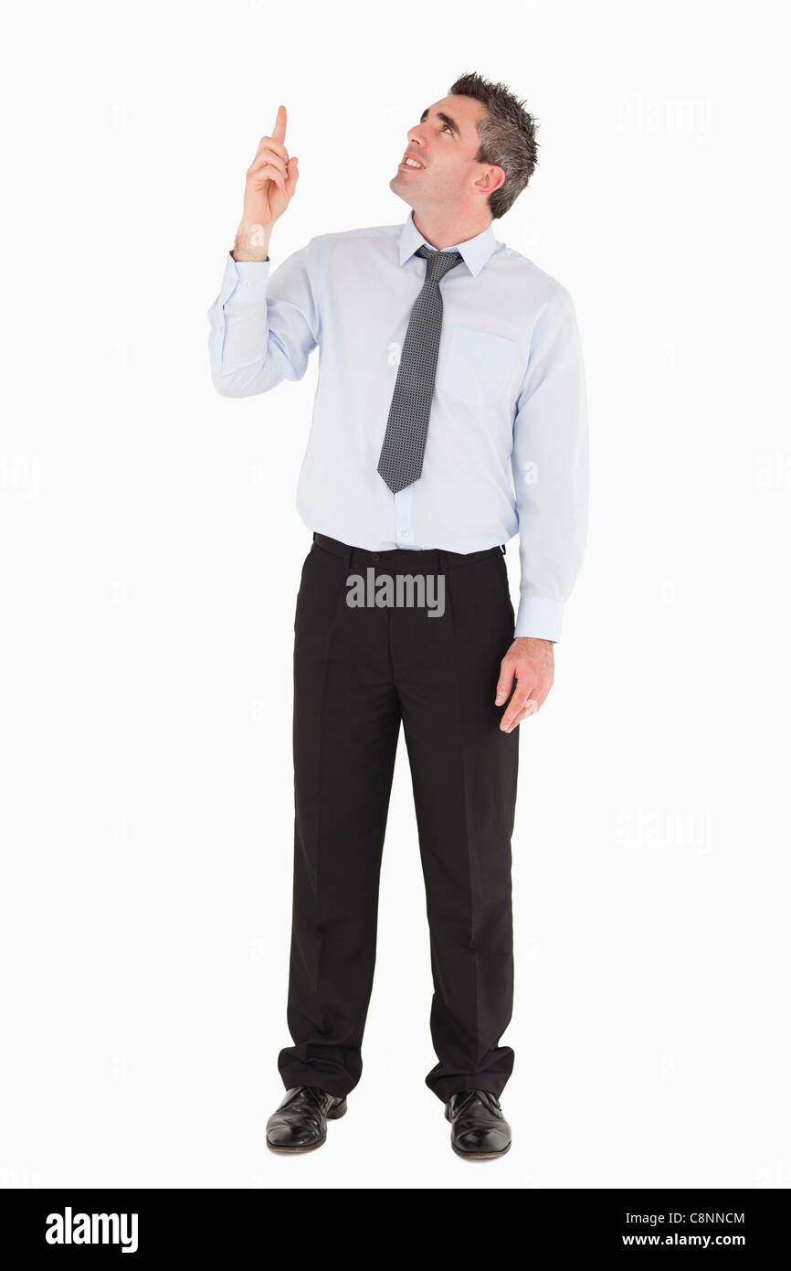 Man pointing at copy space Stock Photo - Alamy