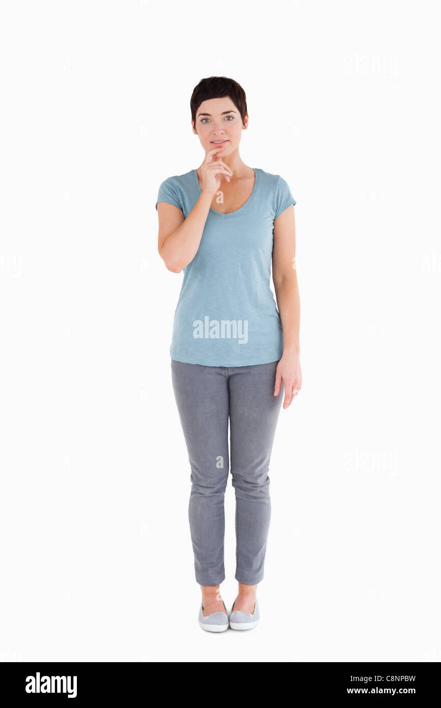 Doubtful woman posing Stock Photo - Alamy