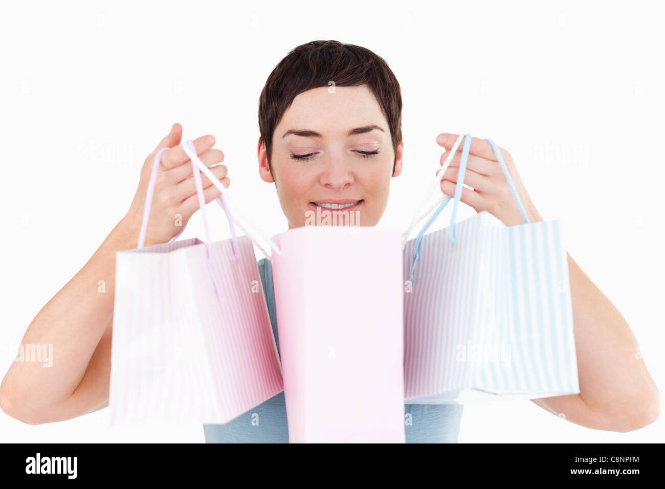 Woman looking in store Cut Out Stock Images & Pictures - Alamy