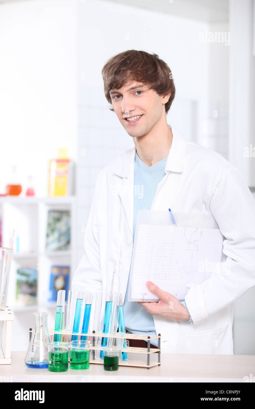 Young man in science laboratory Stock Photo - Alamy