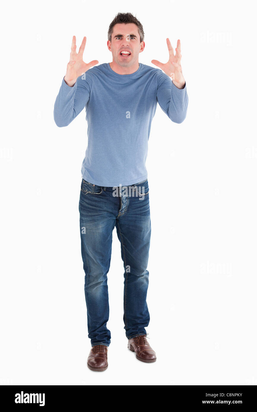 Angry man rising his hands Stock Photo - Alamy