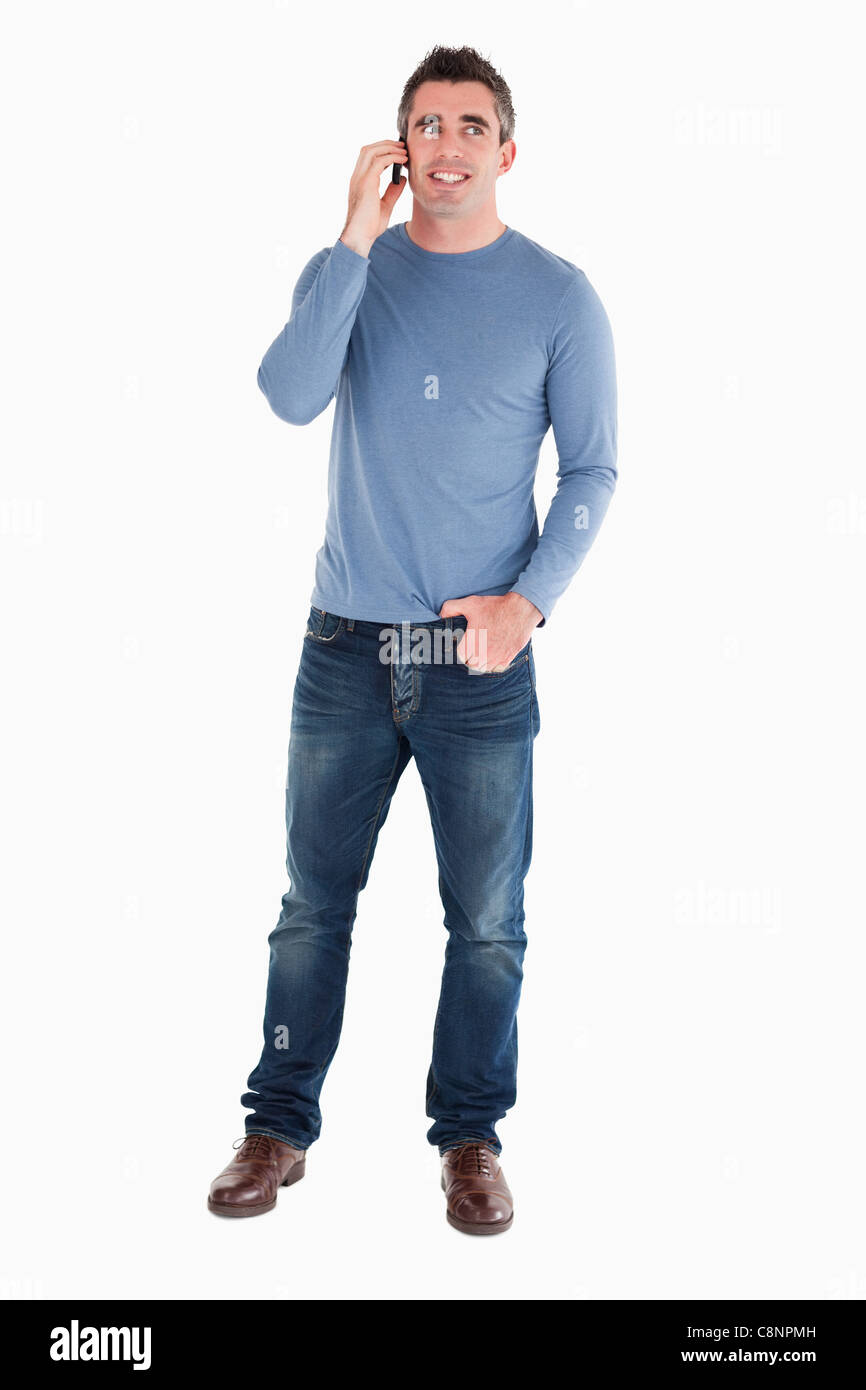 Happy man answering the phone Stock Photo - Alamy