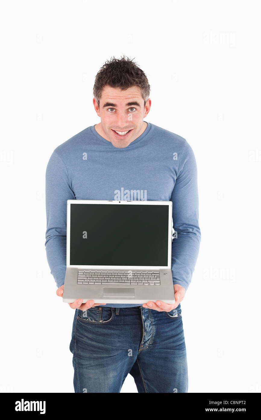 Man showing a notebook Stock Photo - Alamy