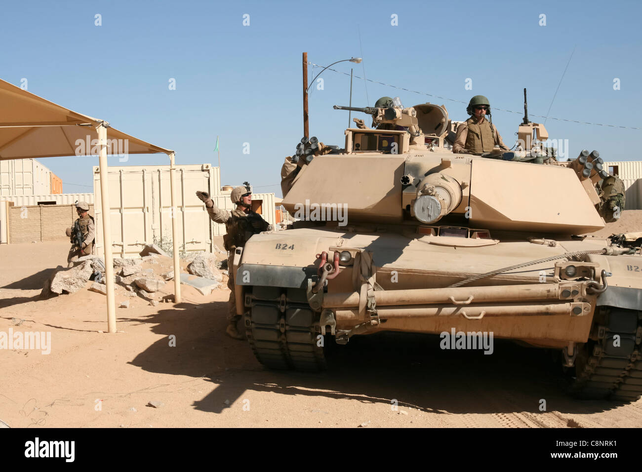 A squad leader from Company E, 2nd Battalion, 25th Marine Regiment ...