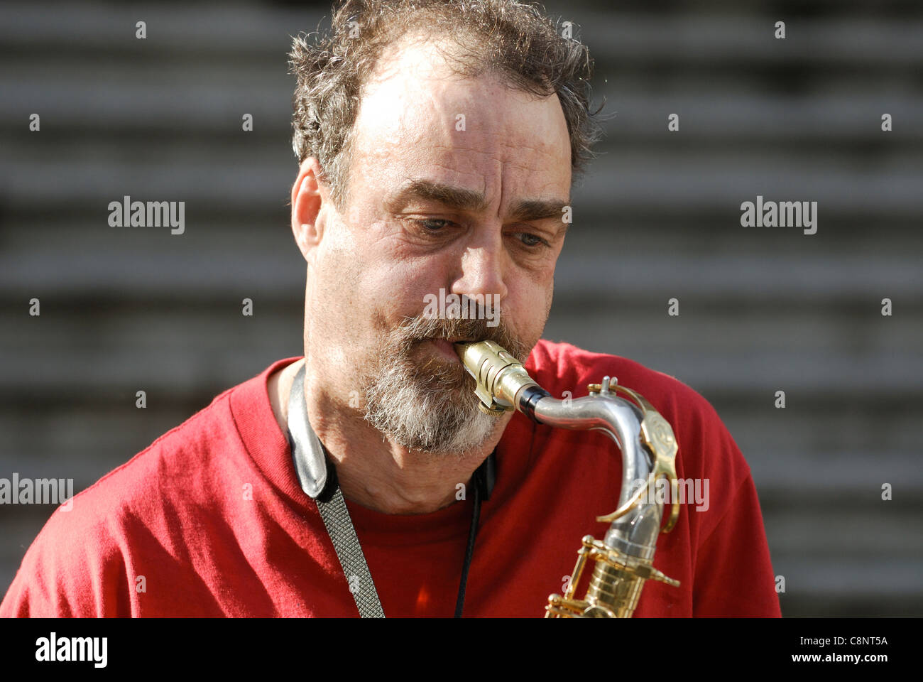 Man playing a saxophone Stock Photo - Alamy