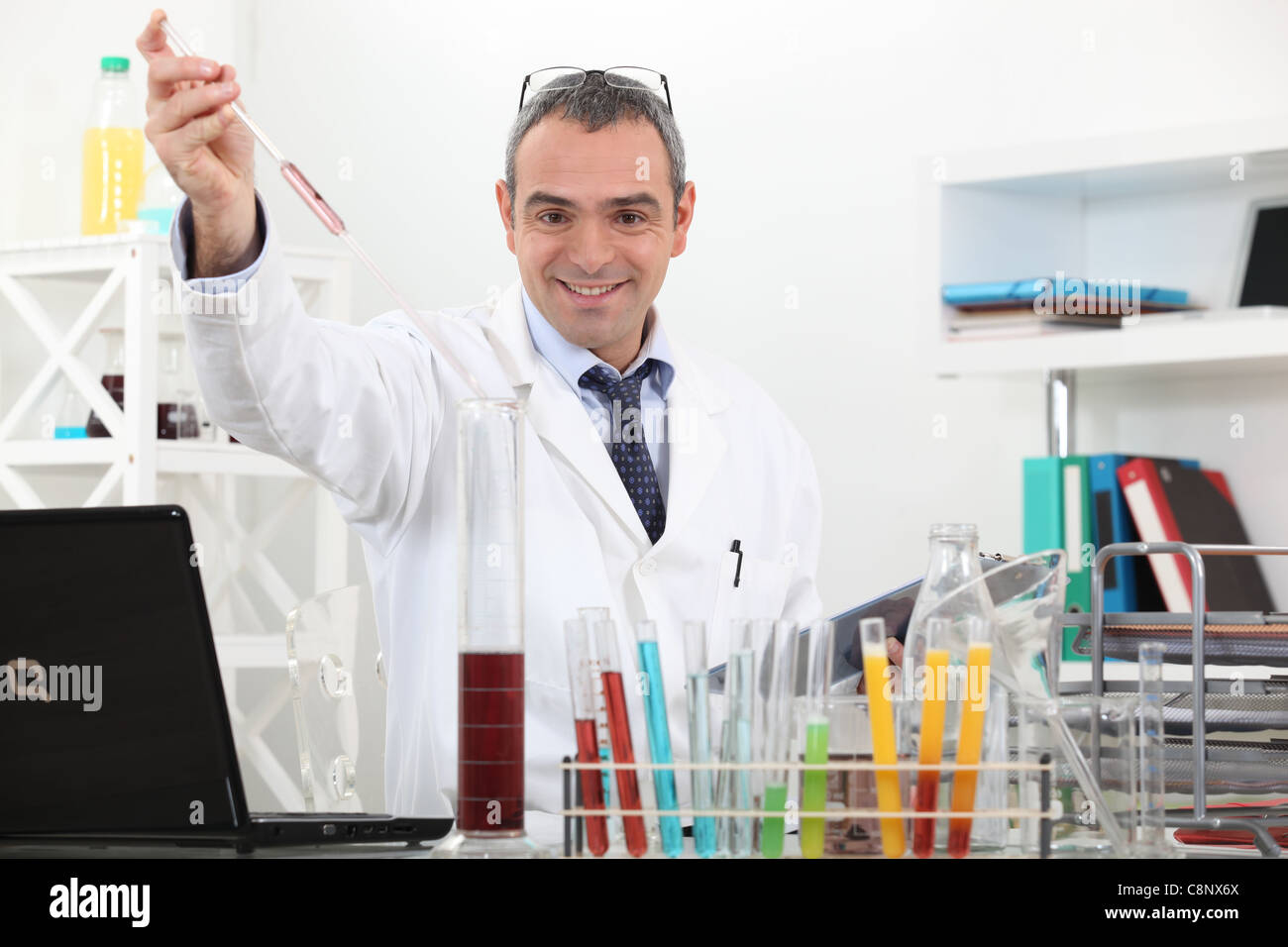 scientist making tests in the lab Stock Photo - Alamy