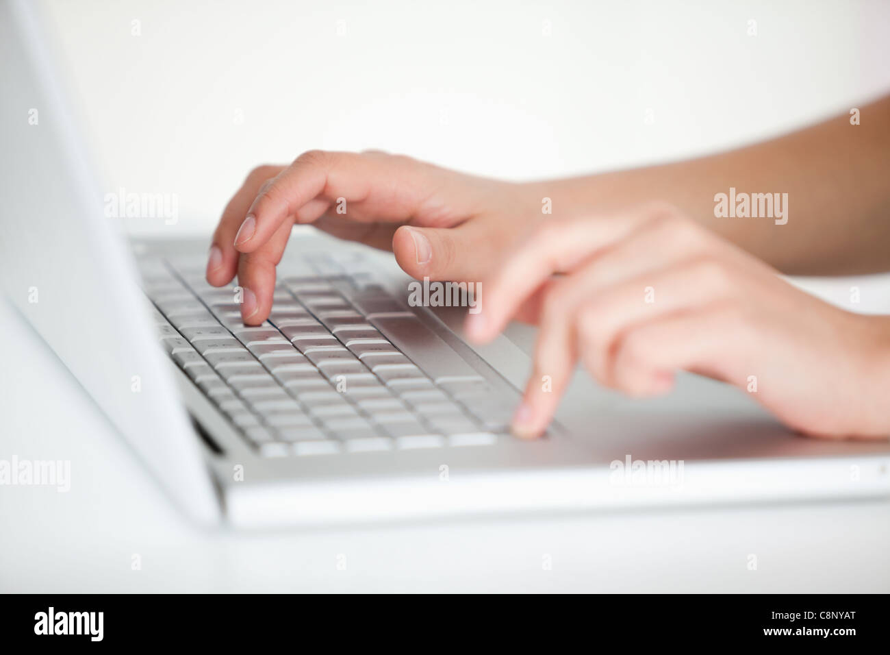 Hands typing on keyboard Stock Photo - Alamy