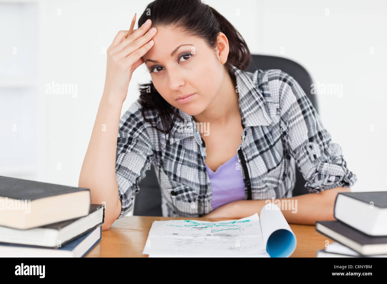 Stressed student learning for school Stock Photo - Alamy
