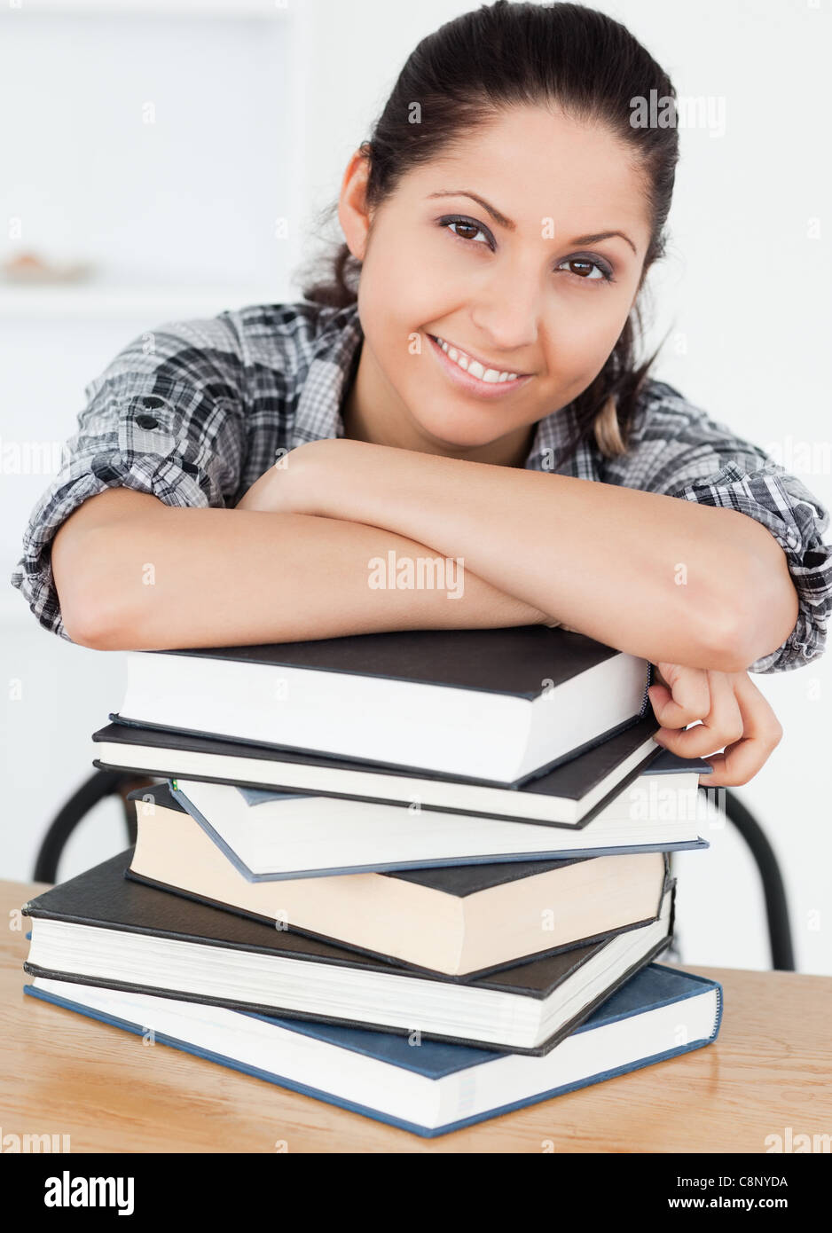 Beautiful young student looking into camera Stock Photo - Alamy