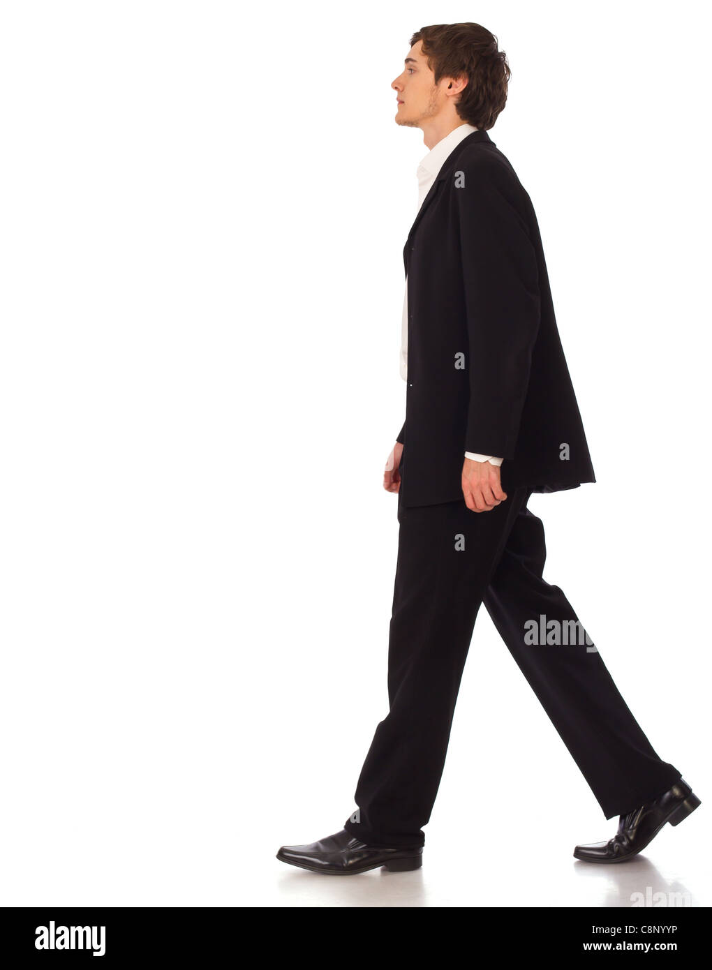 Business man walking on white background Stock Photo - Alamy