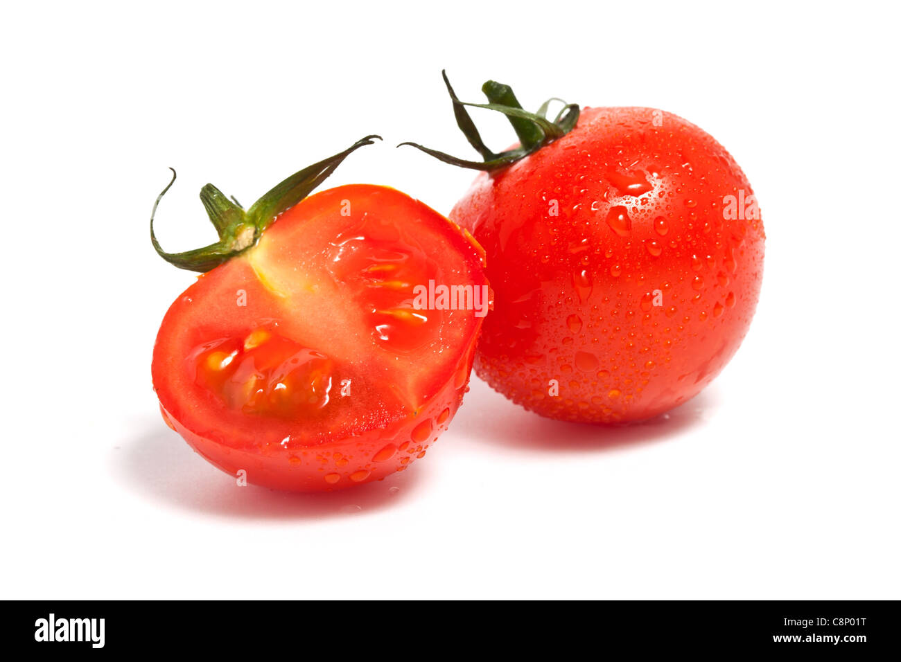 Small round tomato Cut Out Stock Images & Pictures - Alamy