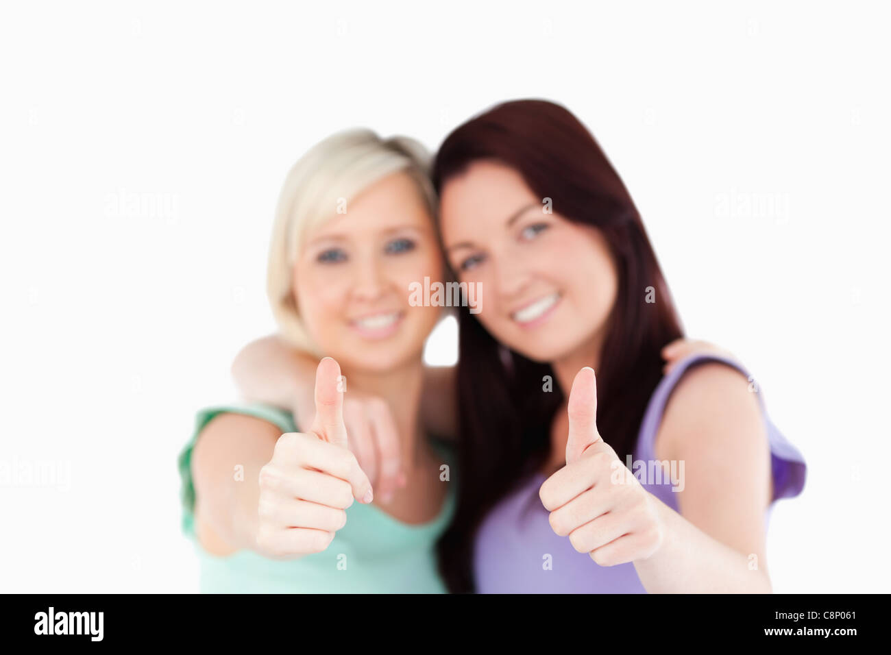 Cute friends posing Stock Photo - Alamy