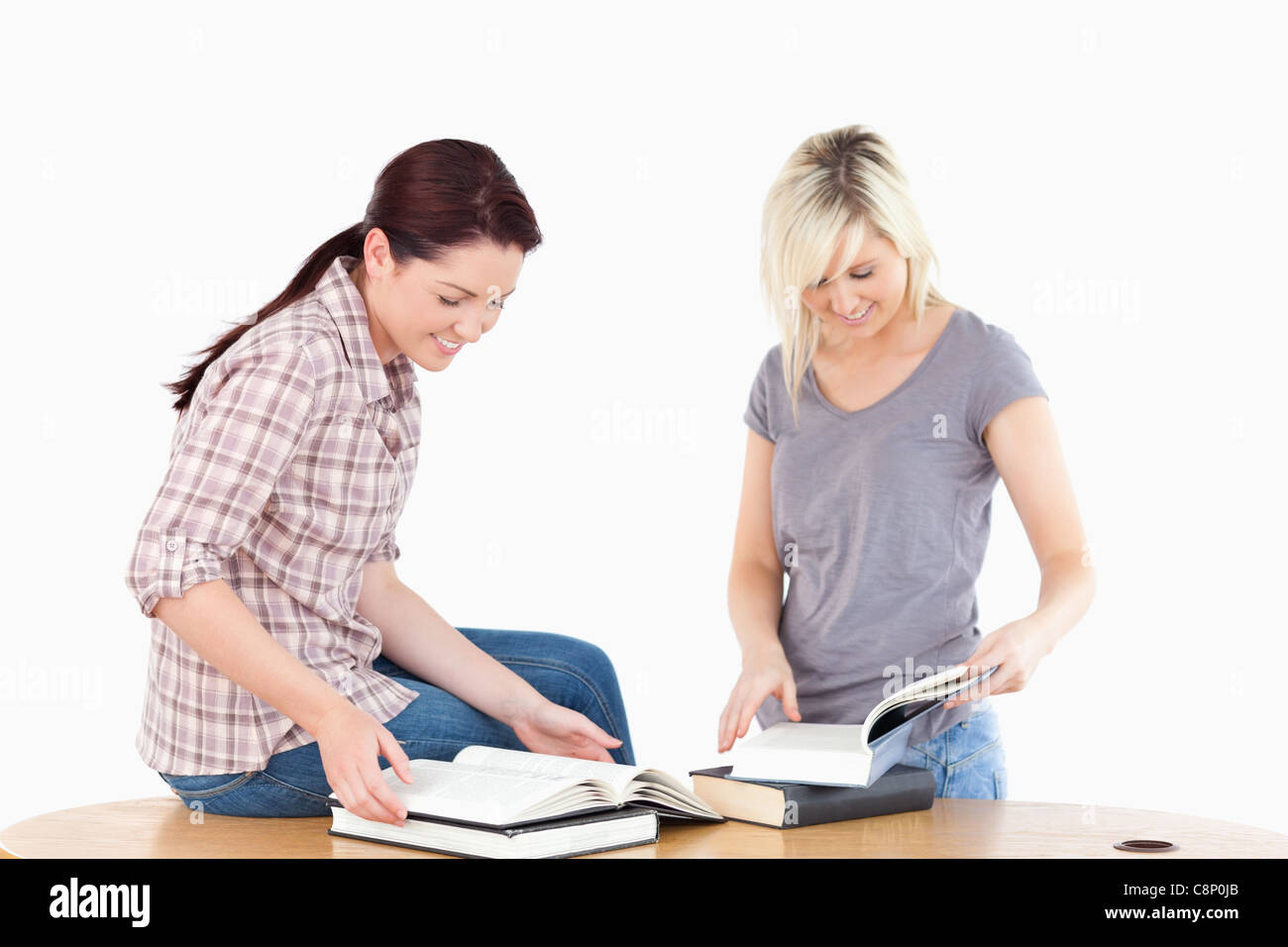 Gorgeous students learning at table Stock Photo - Alamy