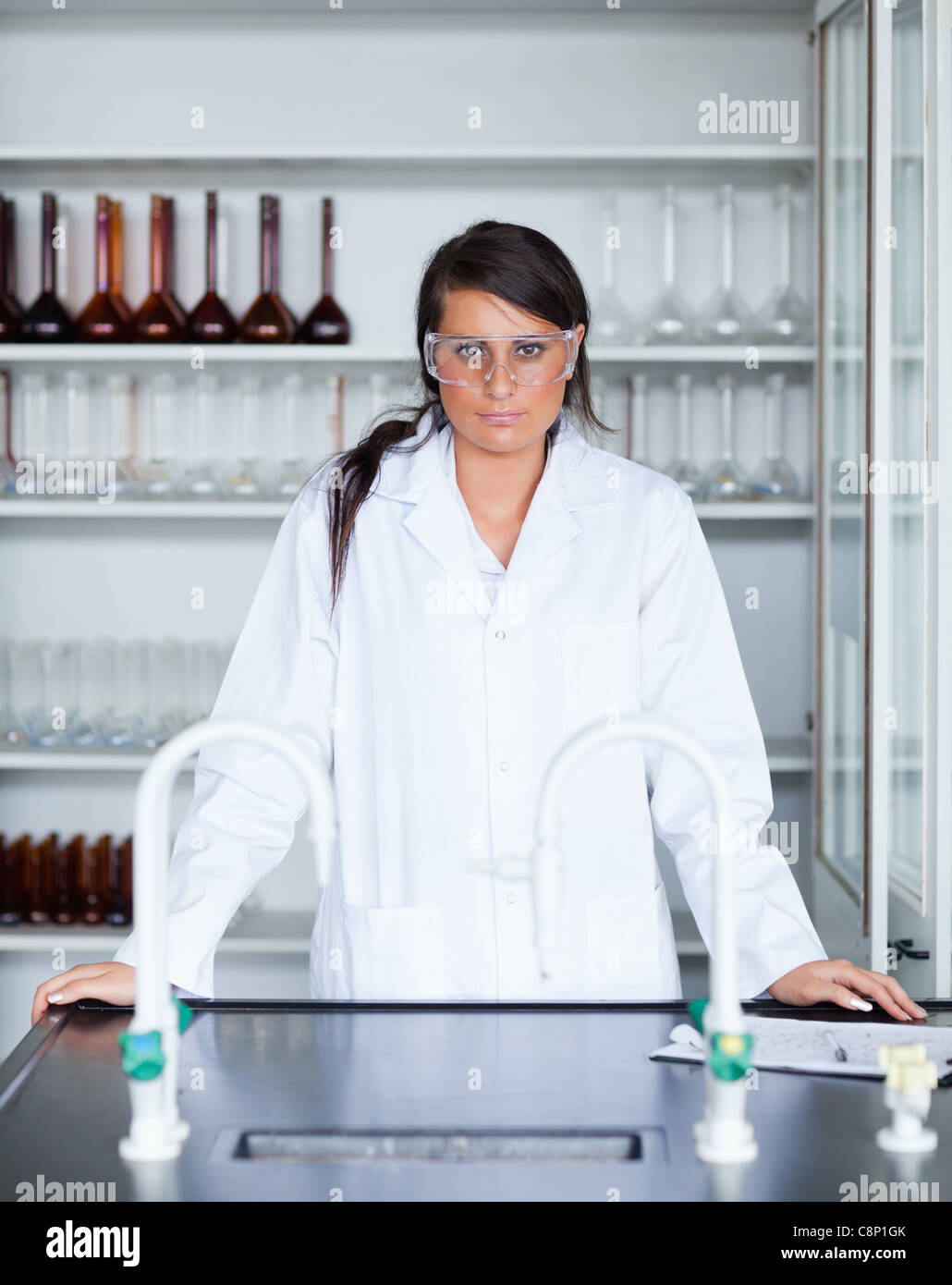Portrait of a female scientist posing Stock Photo - Alamy
