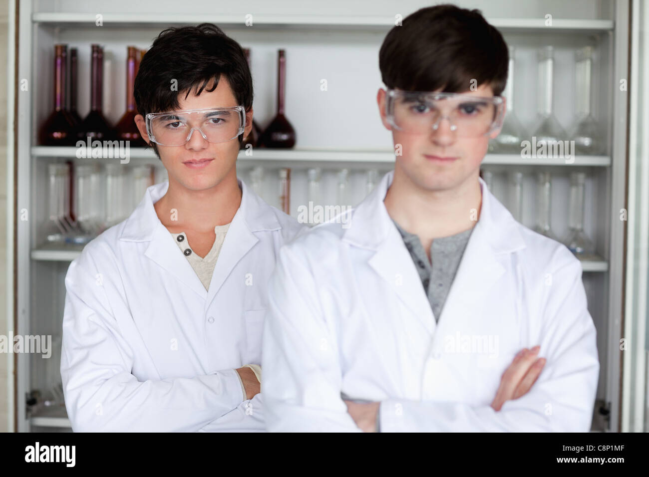 Serious male scientists posing Stock Photo - Alamy