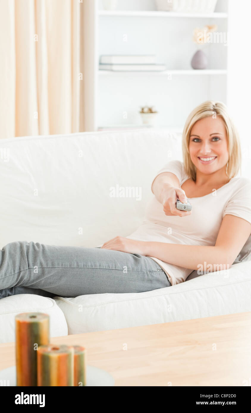 Beauty young woman using tv hi-res stock photography and images - Alamy