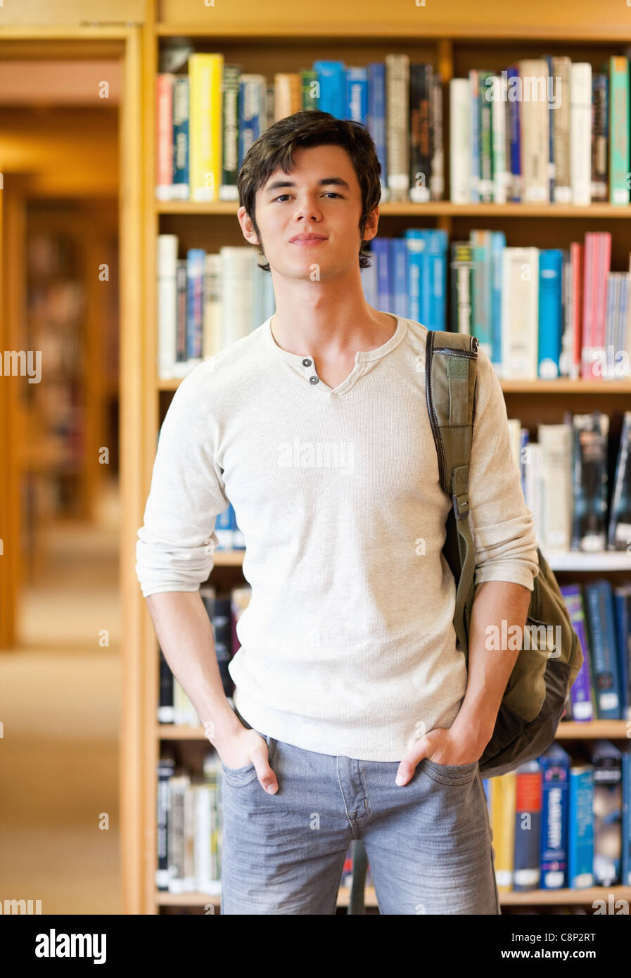 Portrait of a smiling student standing up Stock Photo - Alamy