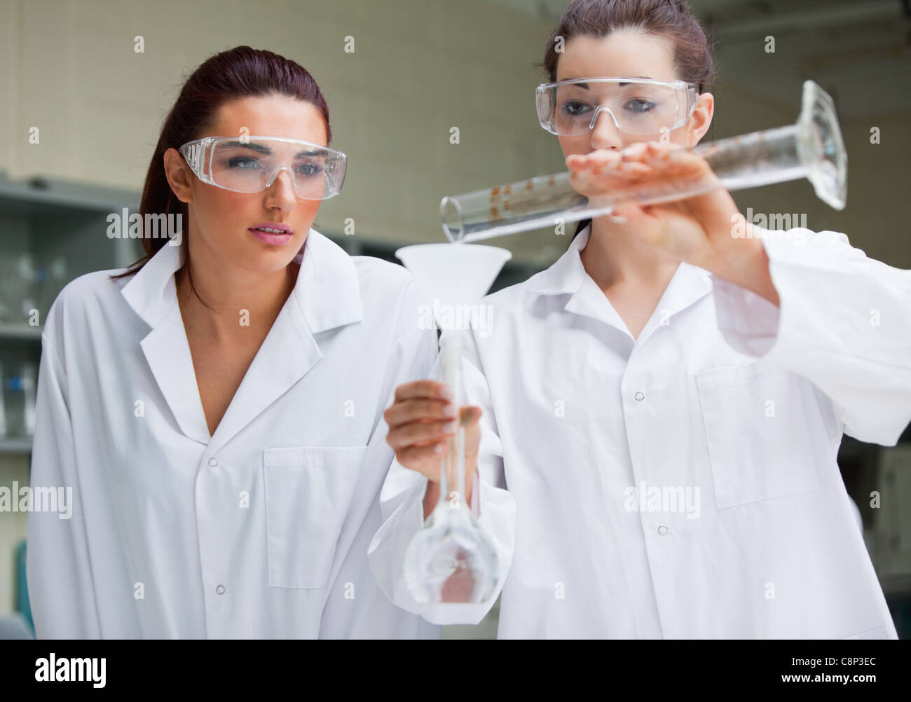 Graduated cylinder funnel hi-res stock photography and images - Alamy