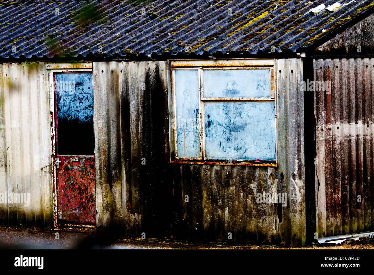 A old shed with old abandoned windows Stock Photo - Alamy