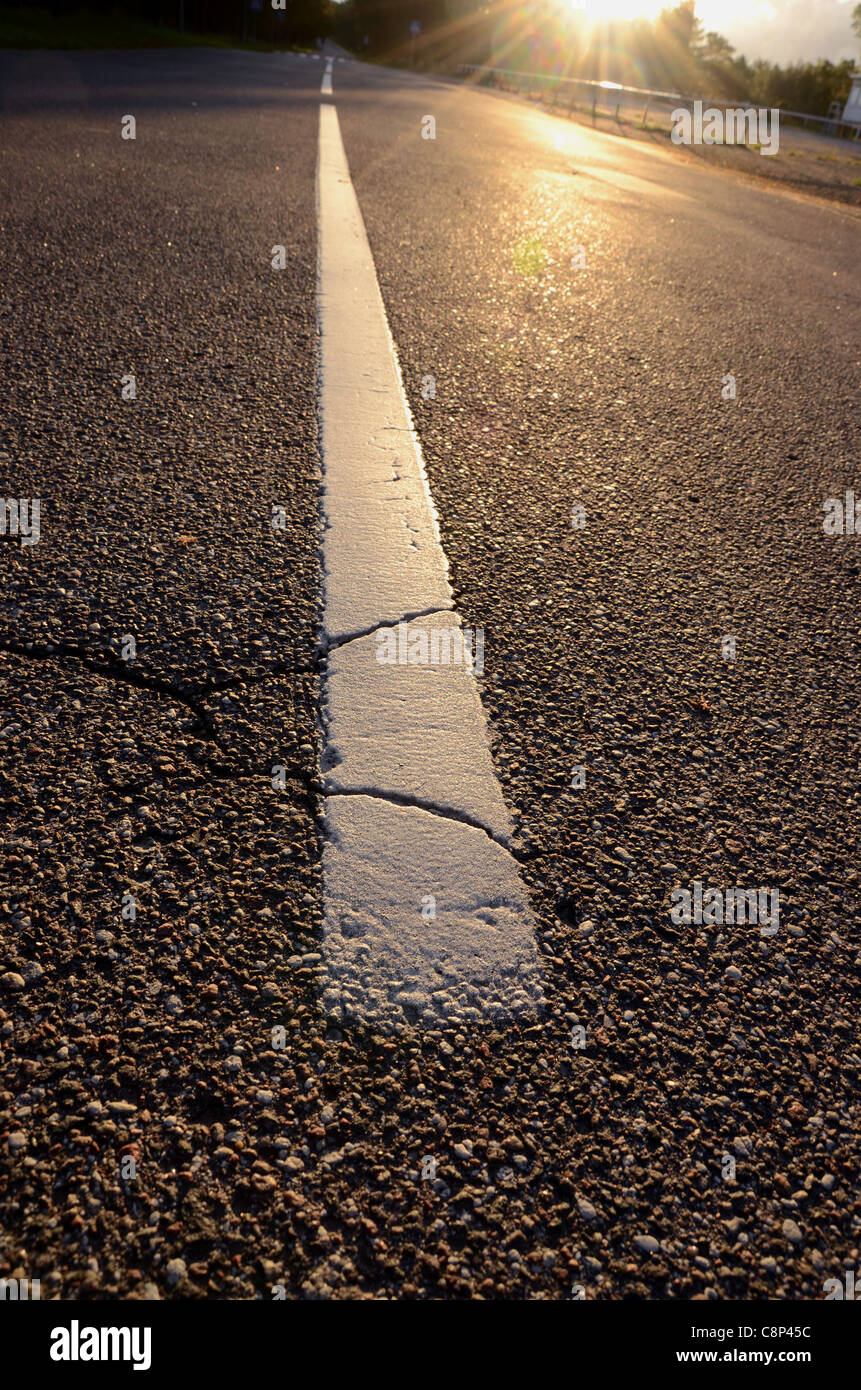 sunrise light on asphalt road and texture Stock Photo - Alamy