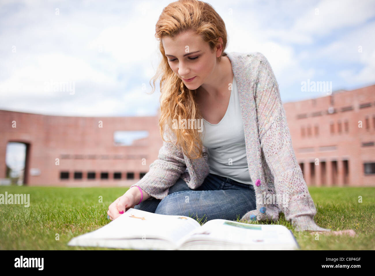 Woman reading a book Stock Photo - Alamy