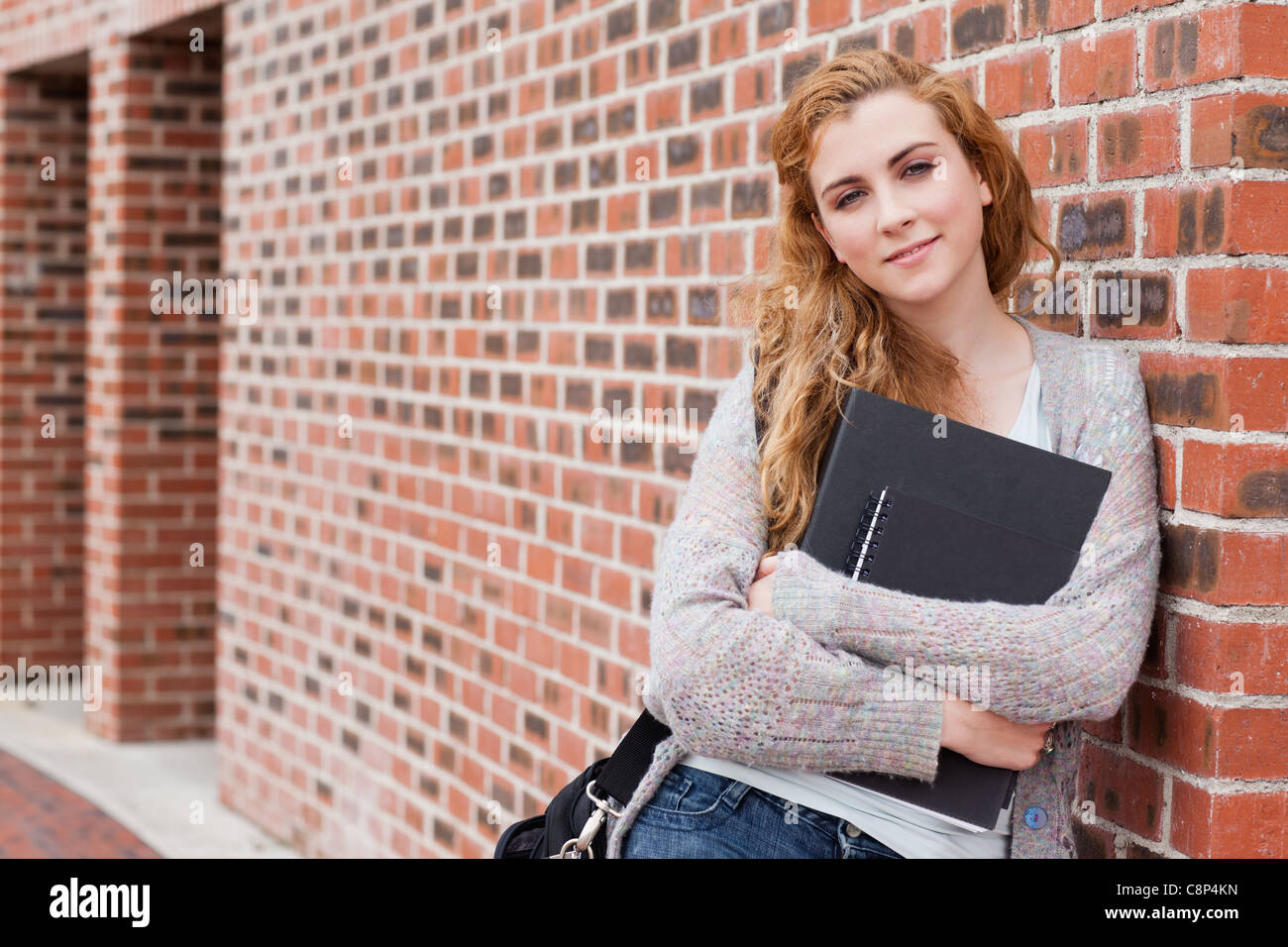 Lovely student posing Stock Photo - Alamy