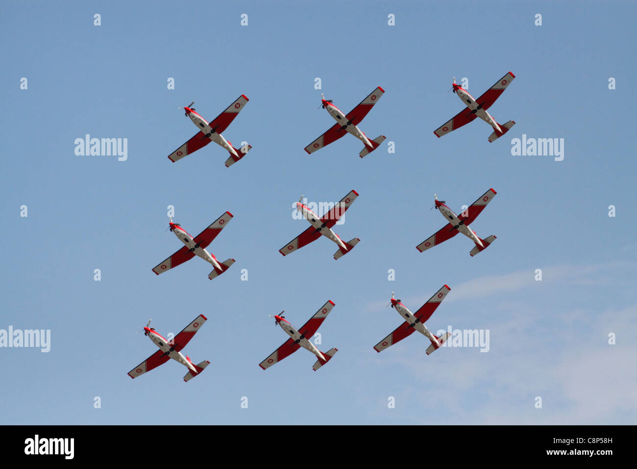 Swiss air force aerobatics team during formation flight, red and white ...