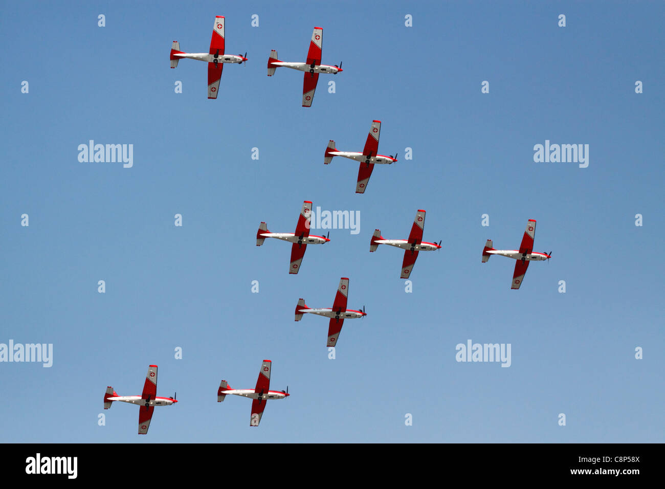 Swiss air force aerobatics team during formation flight, red and white ...