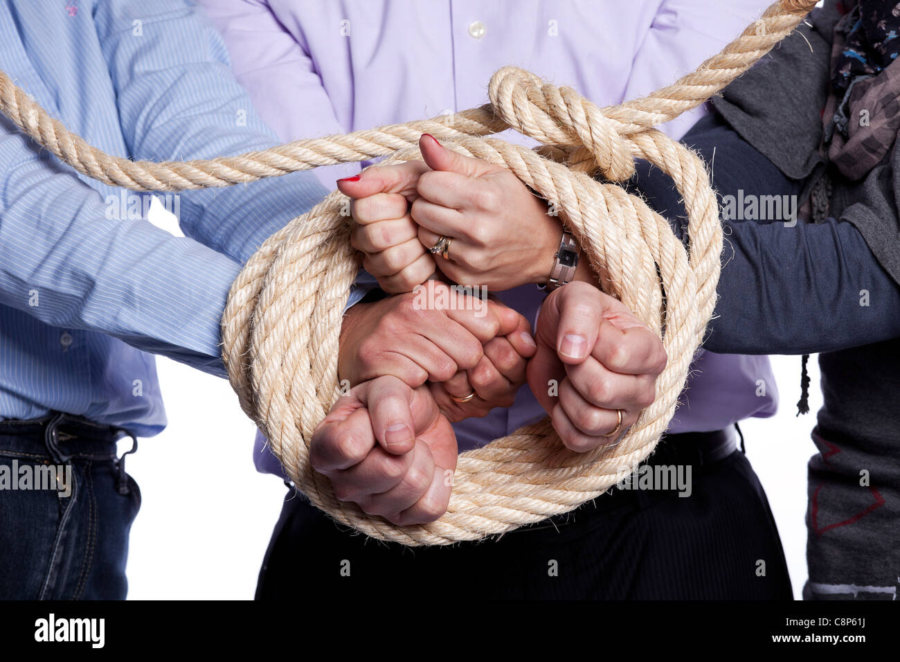 Women hands tied rope hi-res stock photography and images - Alamy