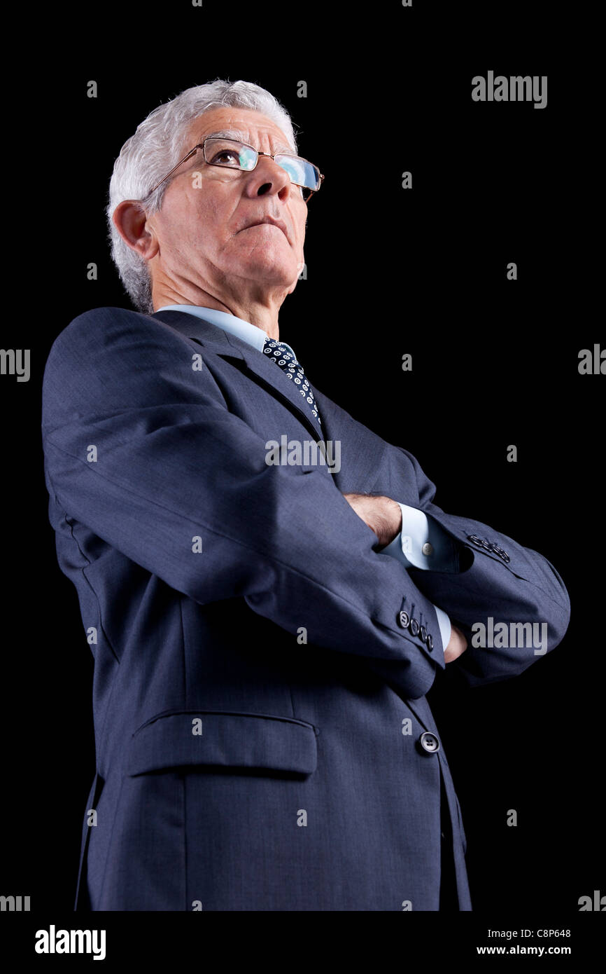 Powerful businessman portrait (isolated on black Stock Photo - Alamy